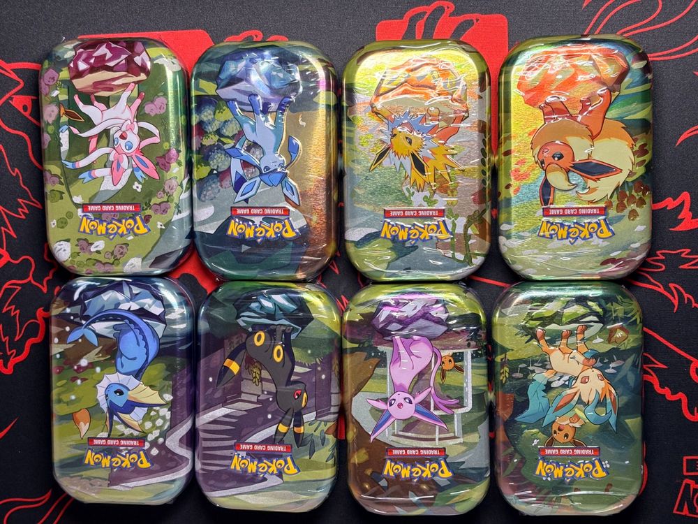 Pokémon Prismatic Evolutions: 8-Pack Mini Tins Bundle (Neu und ...