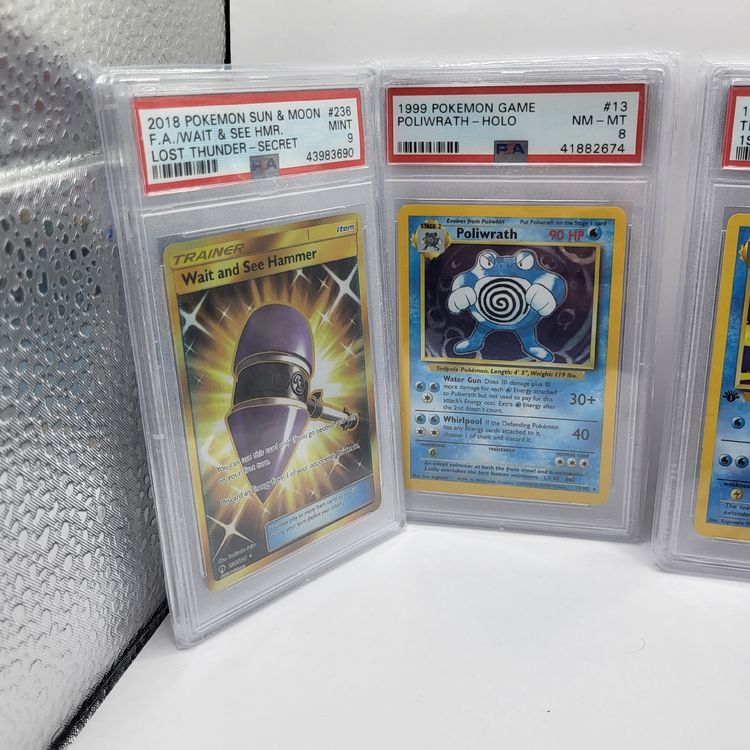 Slabs (PSA & 1 GMA) Loot. 1 first edition card (Neu und ...
