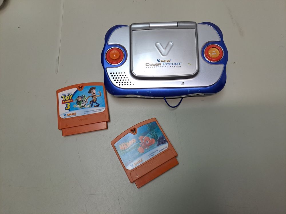 VTech V.Smile Cyber Pocket Konsole + 2 Spiele (Gebraucht) in Chur für ...