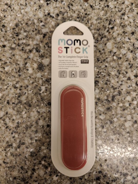 Praktischer MOMO STICK Handgriff Handyhalterung Neu (Neu und originalverpackt) in Olten für CHF ...