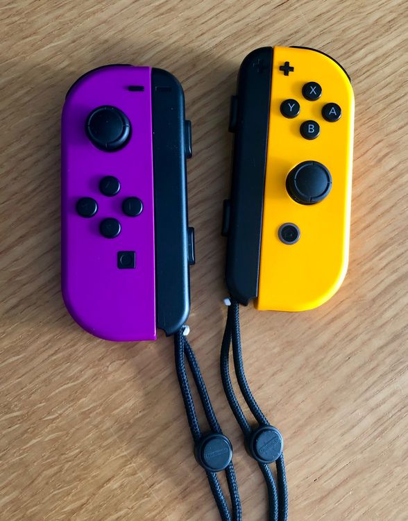Joy-con Neon-Lila/Neon-Orange - Nintendo Switch | Kaufen auf Ricardo