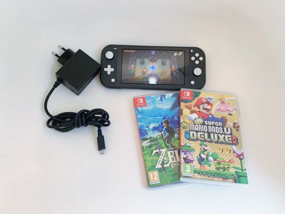 Nintendo Switch Lite + microSD + 2 Jeux (Gebraucht) in Zug für CHF 189 ...