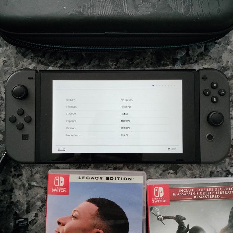 Nintento Switch inkl. Zubehör und 2 Spielen ab CHF 1.- | Kaufen auf Ricardo