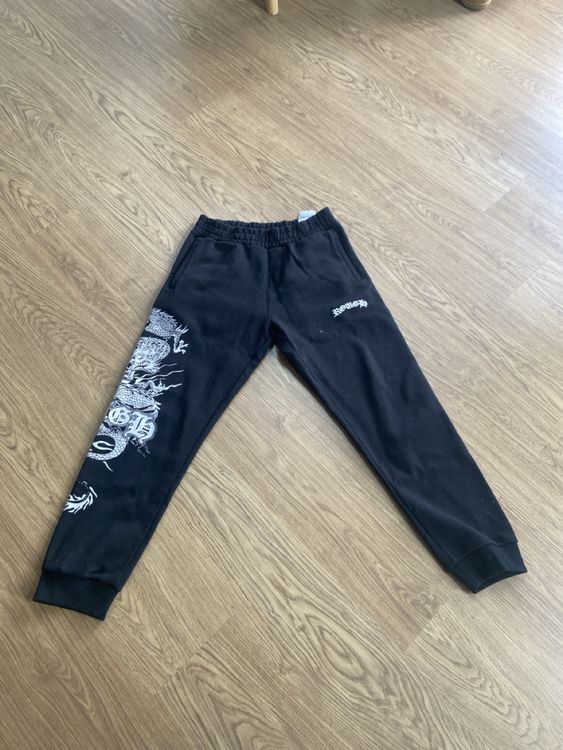 Schwarze FSBN Jogginghose mit Drachenmuster, Grösse M | Kaufen auf Ricardo