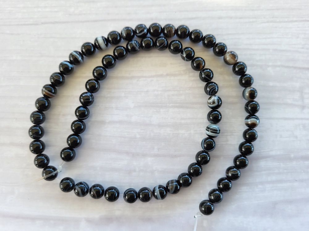 Ein Strang 6 mm schwarzer Streifenachat | Kaufen auf Ricardo