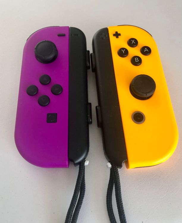 Joy-con Neon-Lila/Neon-Orange - Nintendo Switch | Kaufen auf Ricardo