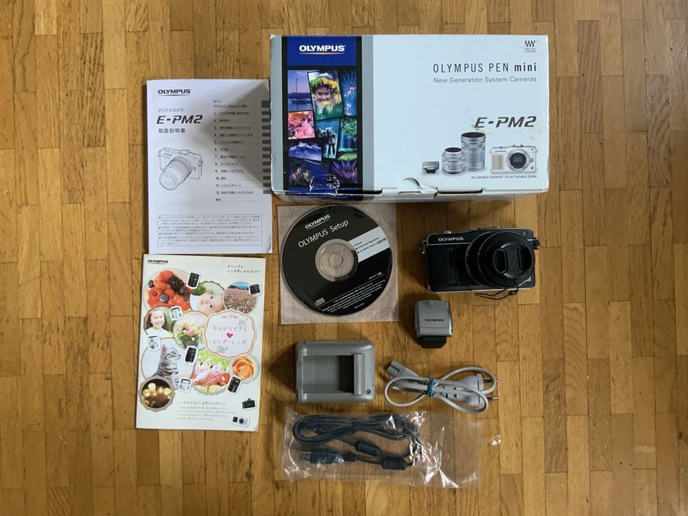 OLYMPUS PEN mini E-PM2 + accessoires DIRECT JAPON! (Gebraucht) in ...