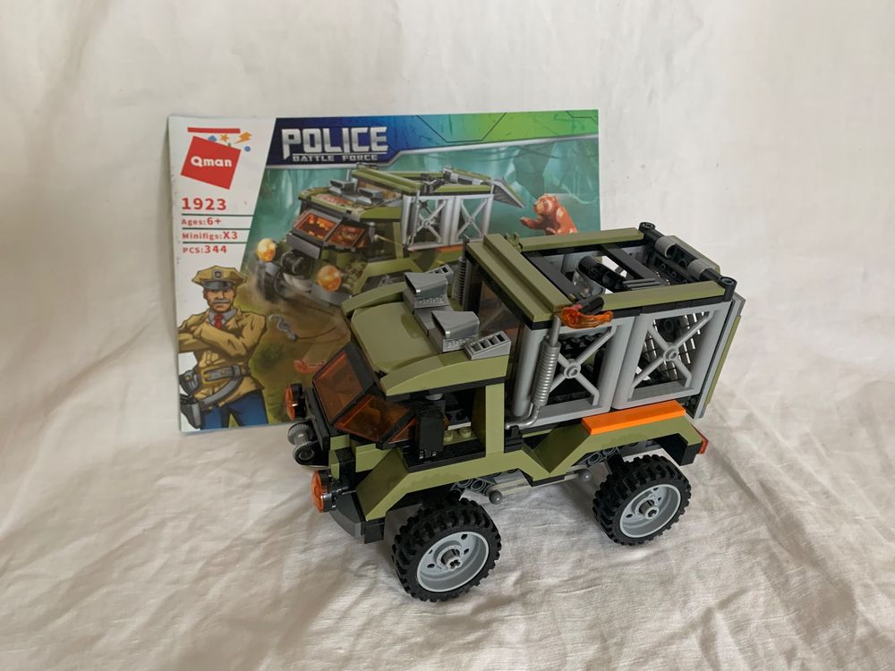 Qman 1923 Polizei Jeep mit Anleitung (Defekt) in Embrach für CHF 4 – mit Lieferung auf Ricardo ...