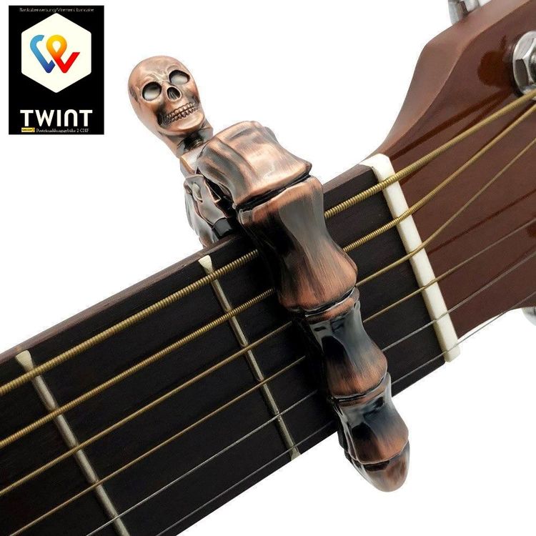 🔶 NEU Finger Schädel Gitarren Capo 6 String (Neu und originalverpackt ...