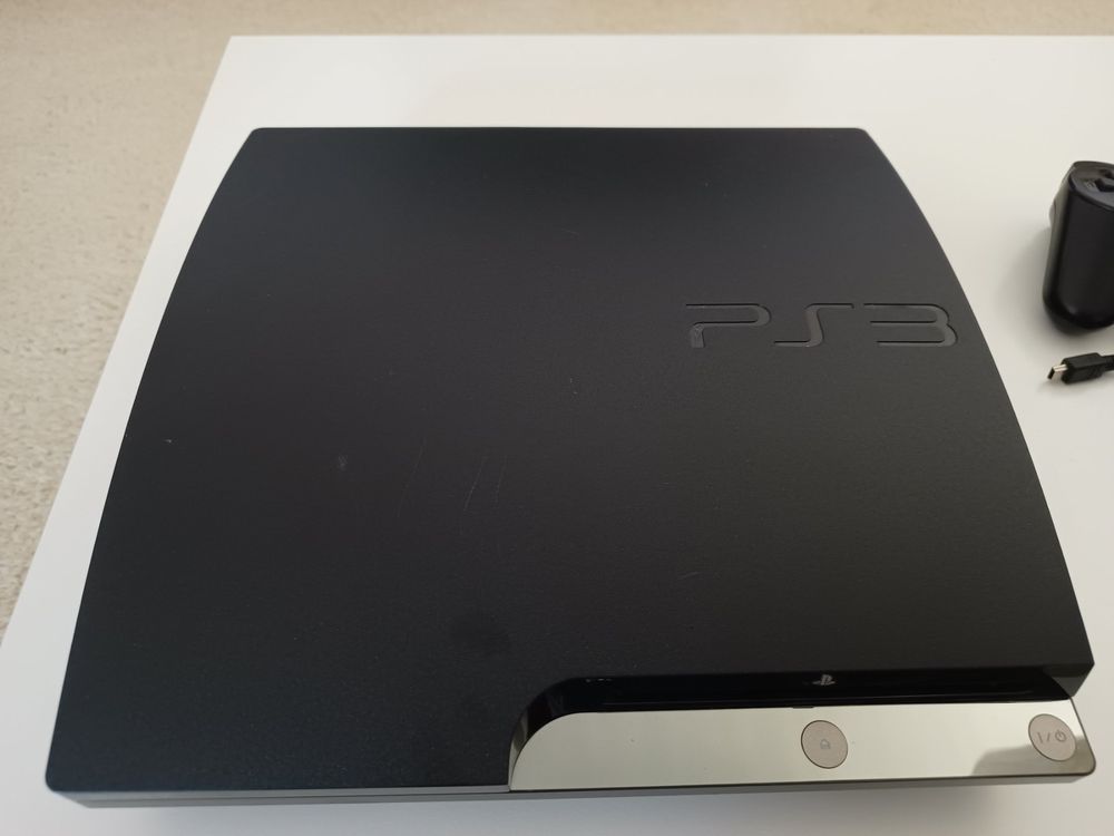 Console Sony PS 3 Slim 320 Go + 14 jeux | Kaufen auf Ricardo
