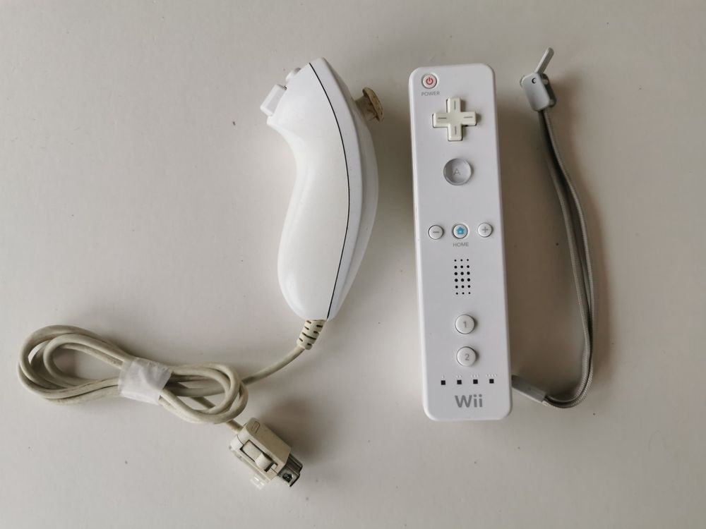 Wii - Remote Controller + NunChuk (Gebraucht) in Lenzburg für CHF 19.9 – mit Lieferung auf ...