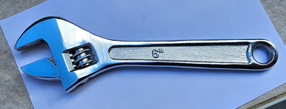 Petite clef à molette chromée neuve,longueur 15 cm, dés 1Fr (Neuf (Voir ...