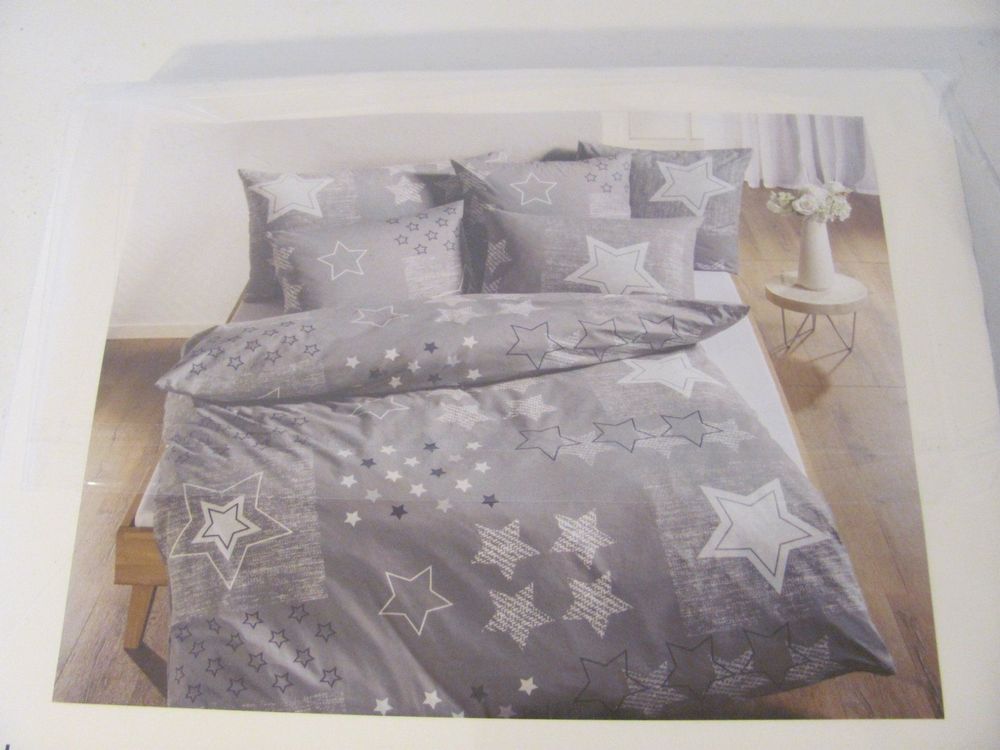 Elegantes Bettwsche Weiss Grau Fotos