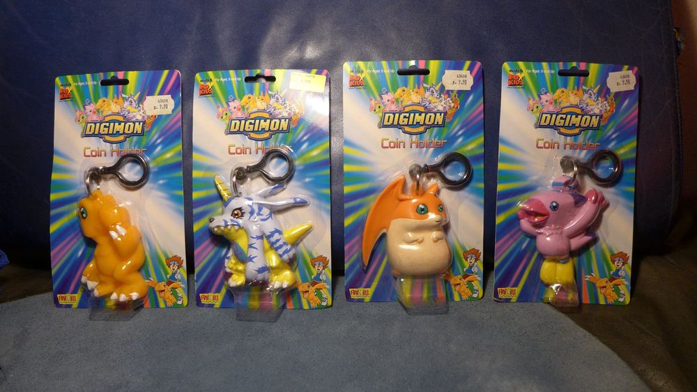 4 digimon coin holder (Neu und originalverpackt) in hinwil für CHF 13 ...