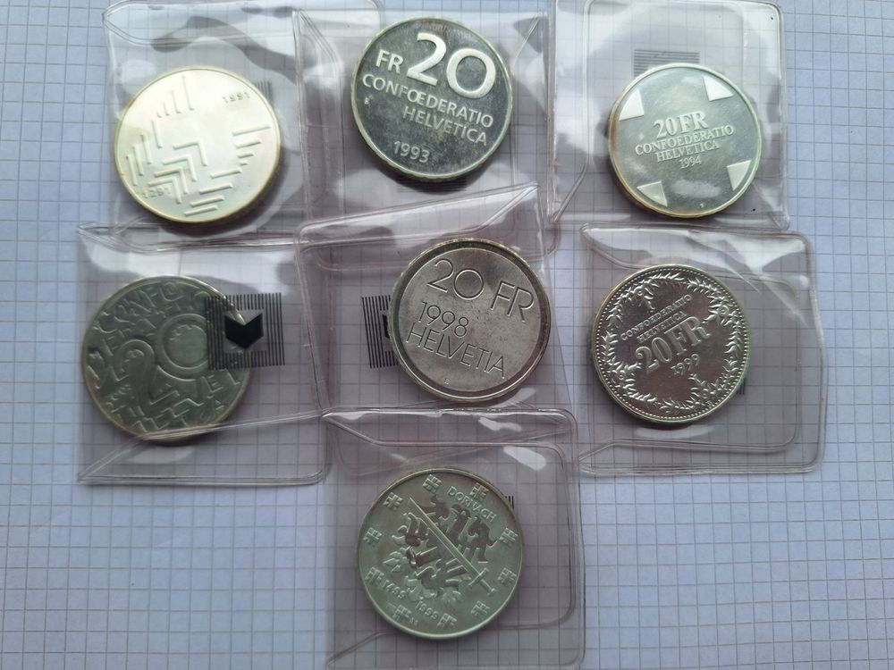 7 STK GEDENKMÜNZEN - SILBER - 20 FRANKEN //1991- 1999 (Neu und originalverpackt) in Huttwil für ...