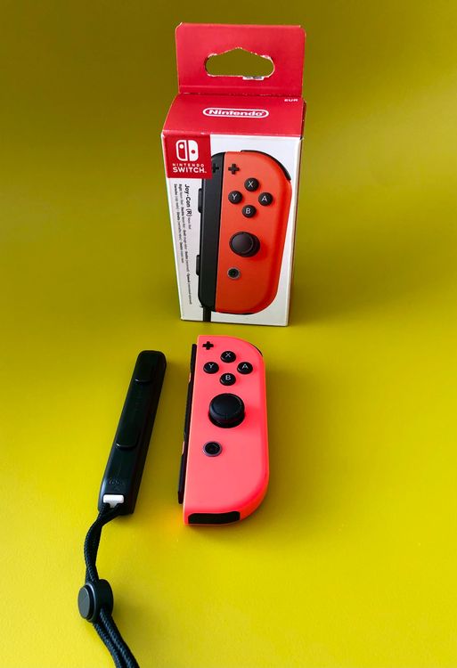 1 joy-con neon red + 1 dragonne - Nintendo Switch | Kaufen auf Ricardo
