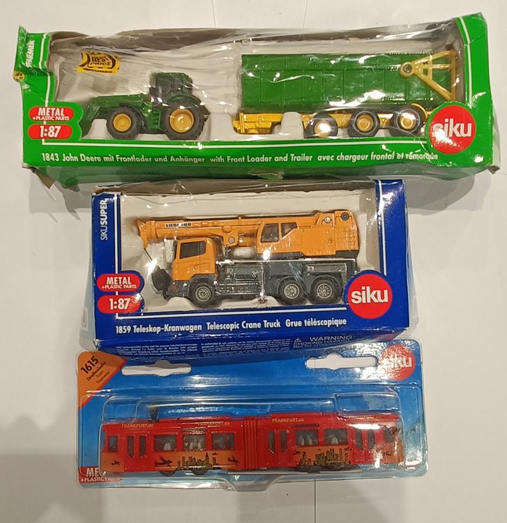 3x Siku modellautos neu OVP, Traktor,Pneukran,Strassenbahn (Neu und originalverpackt) in ...