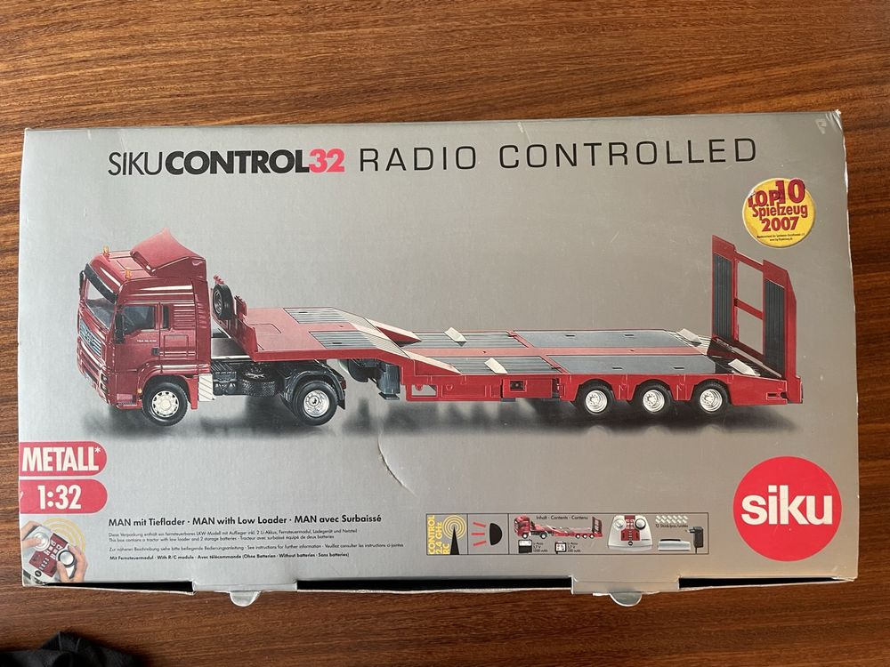 Siku MAN mit Tiefenlader (6721) | Kaufen auf Ricardo