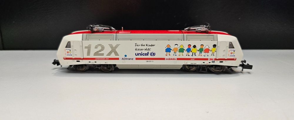 Minitrix Spur N 12694 Elektrolok BR 128 UNICEF (Gebraucht) in Vufflens ...
