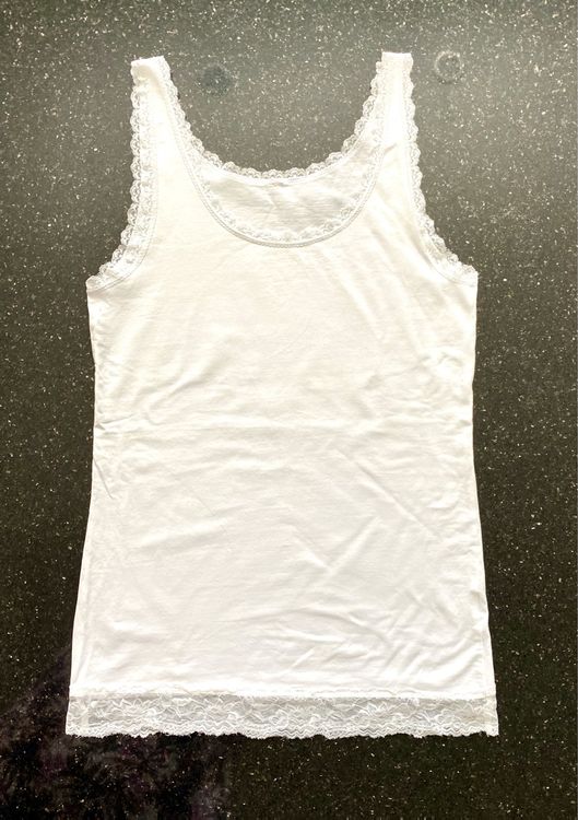 Weisses Damentop mit Spitze Grösse S/M (Neu (gemäss Beschreibung)) in Lyss für CHF 12 – mit ...
