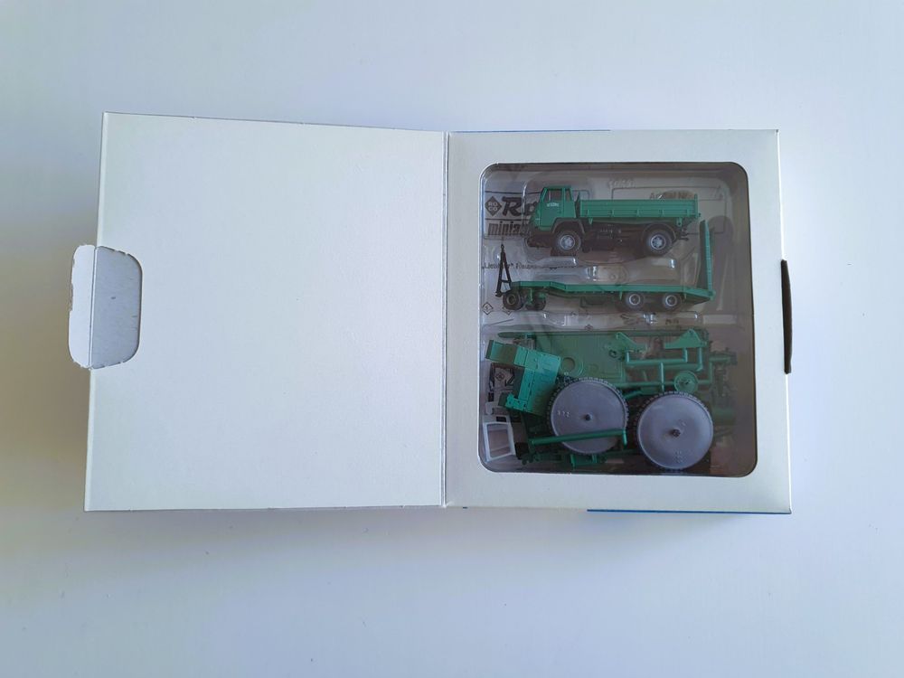 ROCO 1516, Zugmaschine: Steyr 91 4x4 mit Liebherr 922, neu (Neu und ...