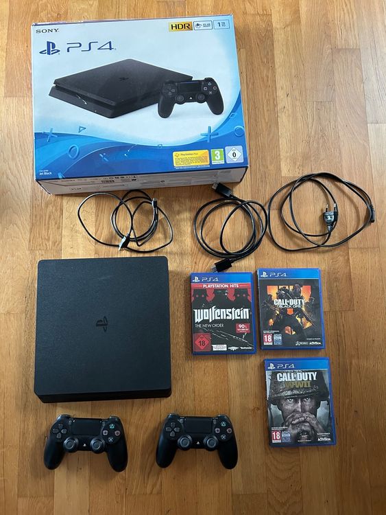 Playstation 4, 1 TB (2018) mit 2 Controllern und 3 Games (Gebraucht) in ...