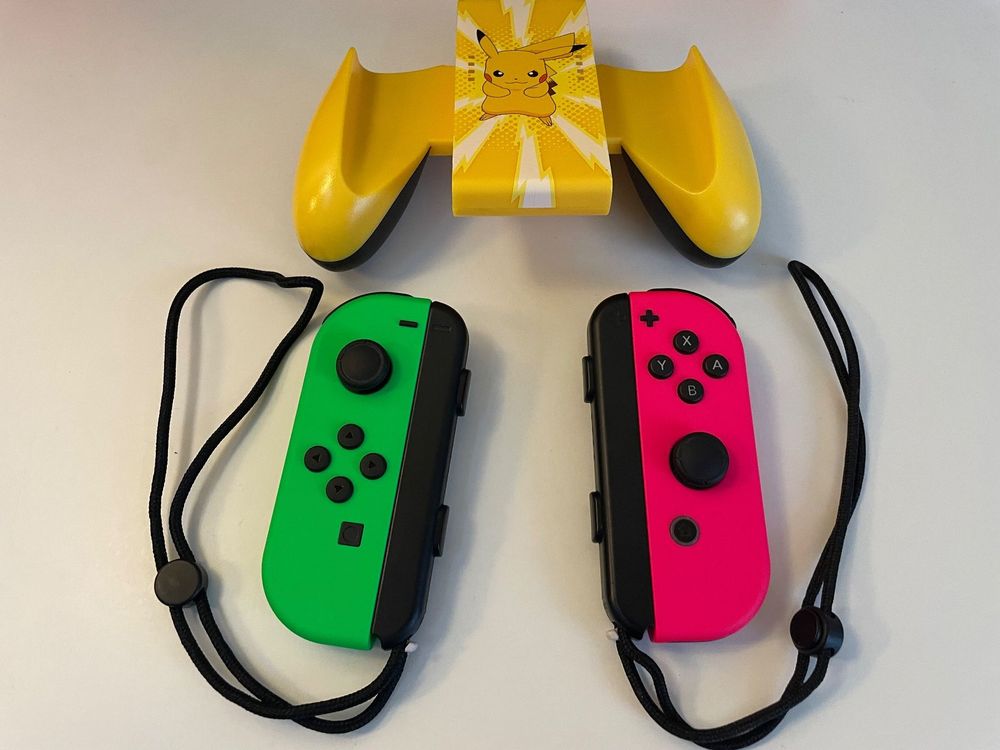 Nintendo Switch Joy-Cons, Pink/Grün, inkl. Pikachu Halterung (Gebraucht ...