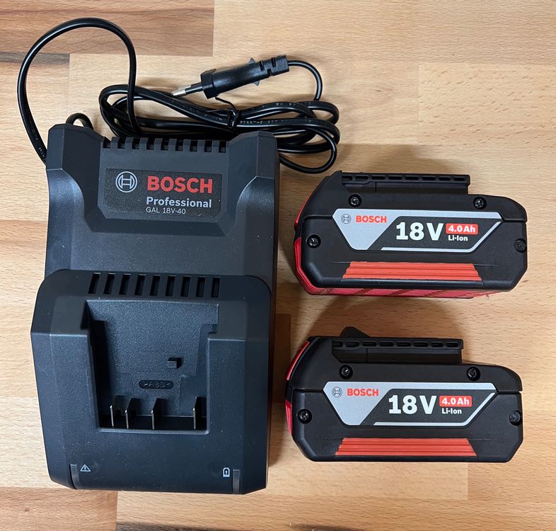 Bosch chargeur GAL 18V-40 + 2 batteries GBA 18V 4.0Ah Li-Ion | Kaufen auf Ricardo