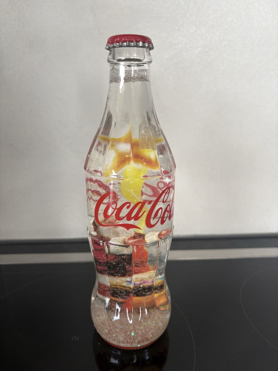 Glass bottle from Coca-Cola with Santa Claus and snowflakes (Neu ...