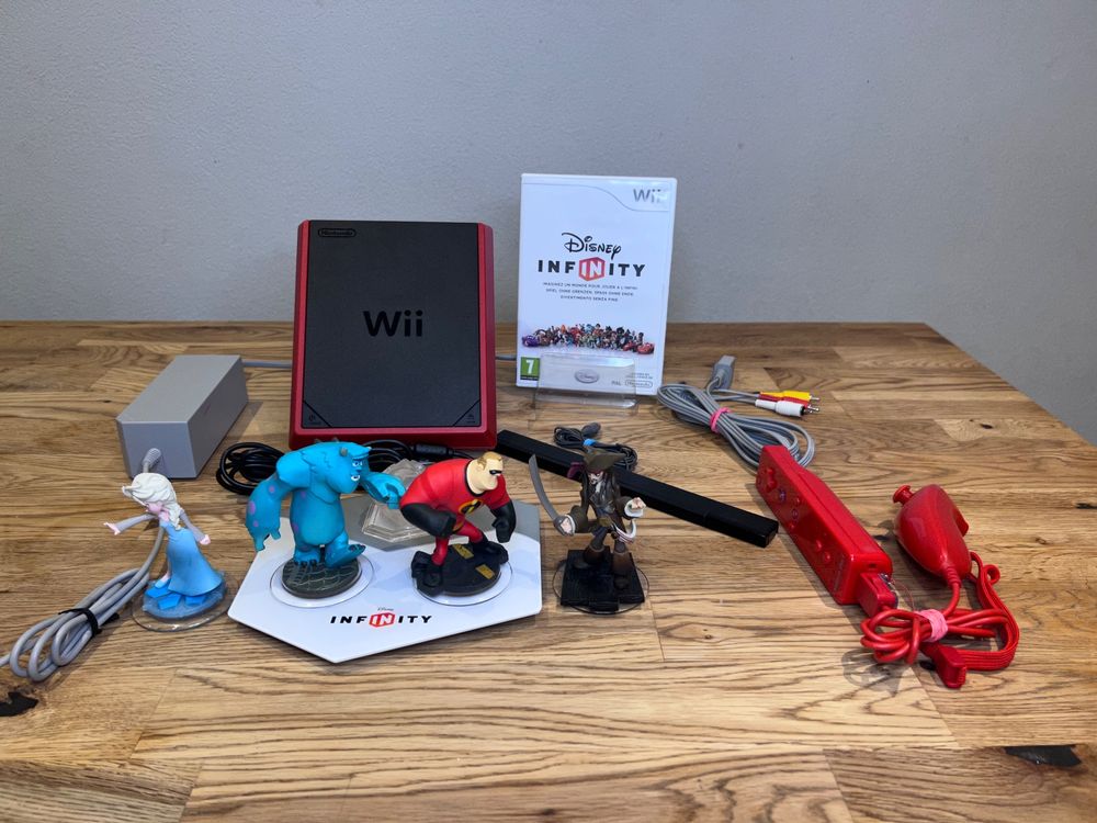 Nintendo Wii Mini mit Zubehör und Infinity set ab 1.- (Defekt) in ...