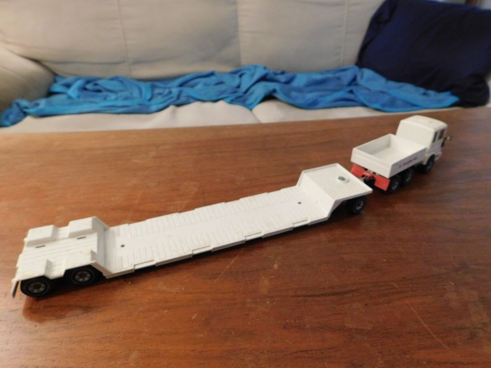 Siku MAN mit Tieflader weiss (Gebraucht) in Strengelbach für CHF 19 – mit Lieferung auf Ricardo ...