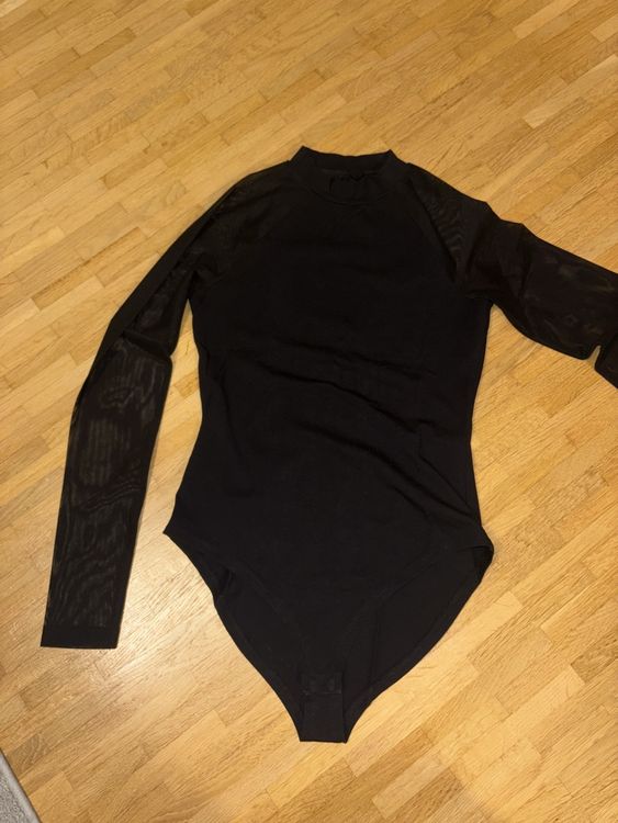 Schwarzer Body mit transparenten Ärmeln (Gebraucht) in Zürich für CHF ...