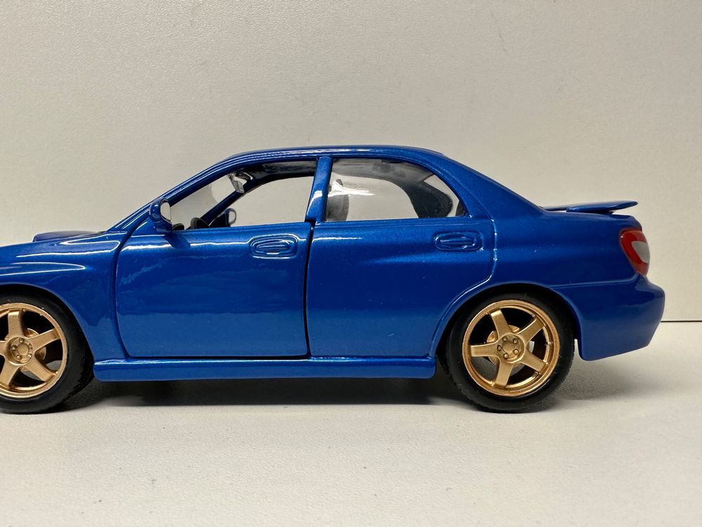 Subaru Impreza WRX (Bugeye) 1:24, blau, Bburago, inkl. OVP (Gebraucht) in Strengelbach für CHF ...