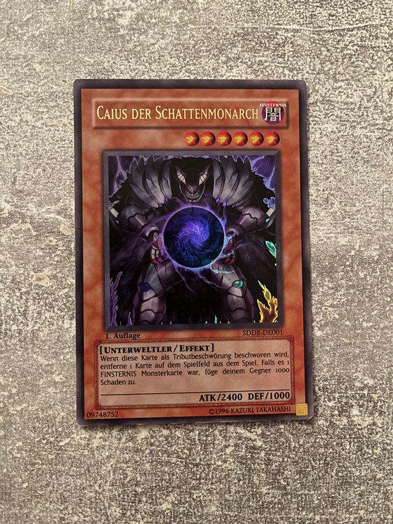Caius der Schattenmonarch (SDDE-DE001), Ultra Rare | Kaufen auf Ricardo