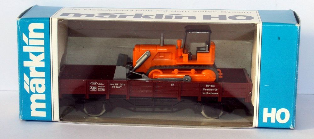 Märklin 4424 Niederbordwagen mit Trax (Neu und originalverpackt) in ...