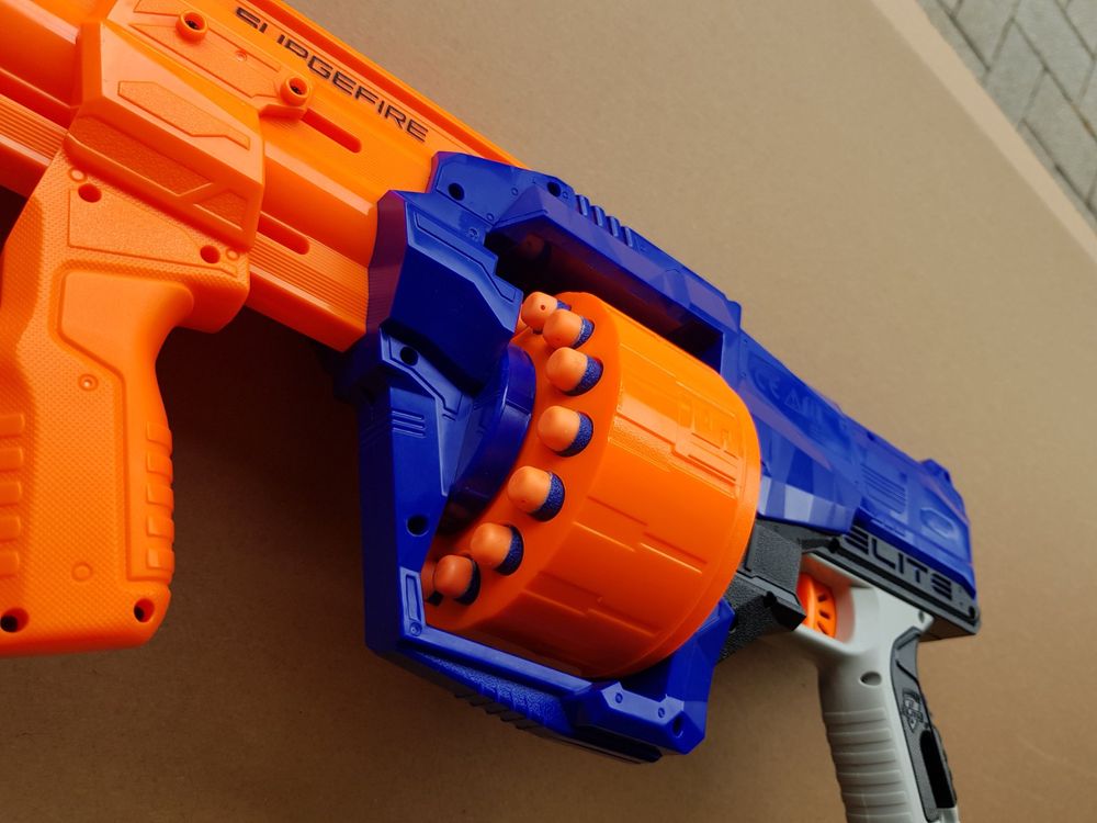 NERF Surgefire mit einer Rotationstrommel von 15 Darts | Kaufen auf Ricardo