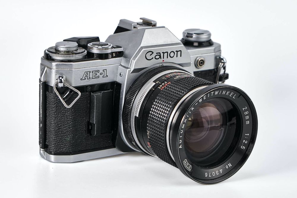 Canon AE-1 mit 28mm f2.5 - revidiert - getestet | Kaufen auf Ricardo