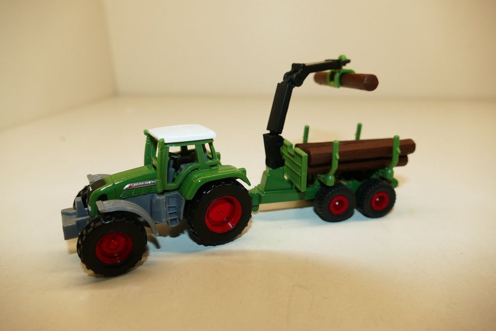 Siku: Traktor mit forstwirtschaftlichem Anhänger | Kaufen auf Ricardo