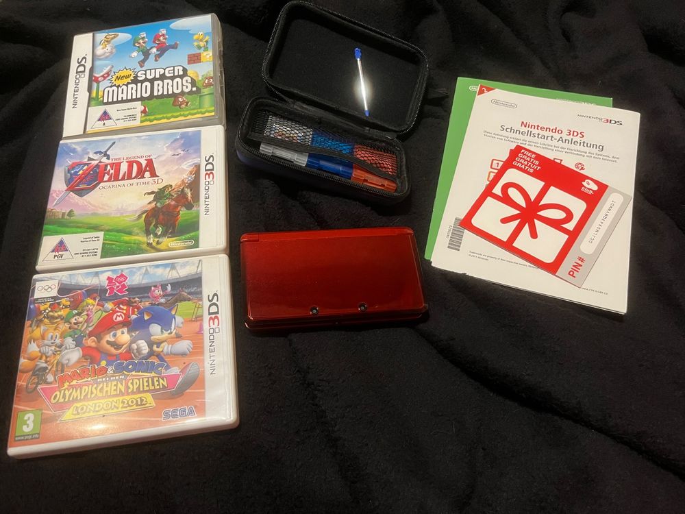 Nintendo 3DS rot mit Hülle und 3 Spielen | Kaufen auf Ricardo
