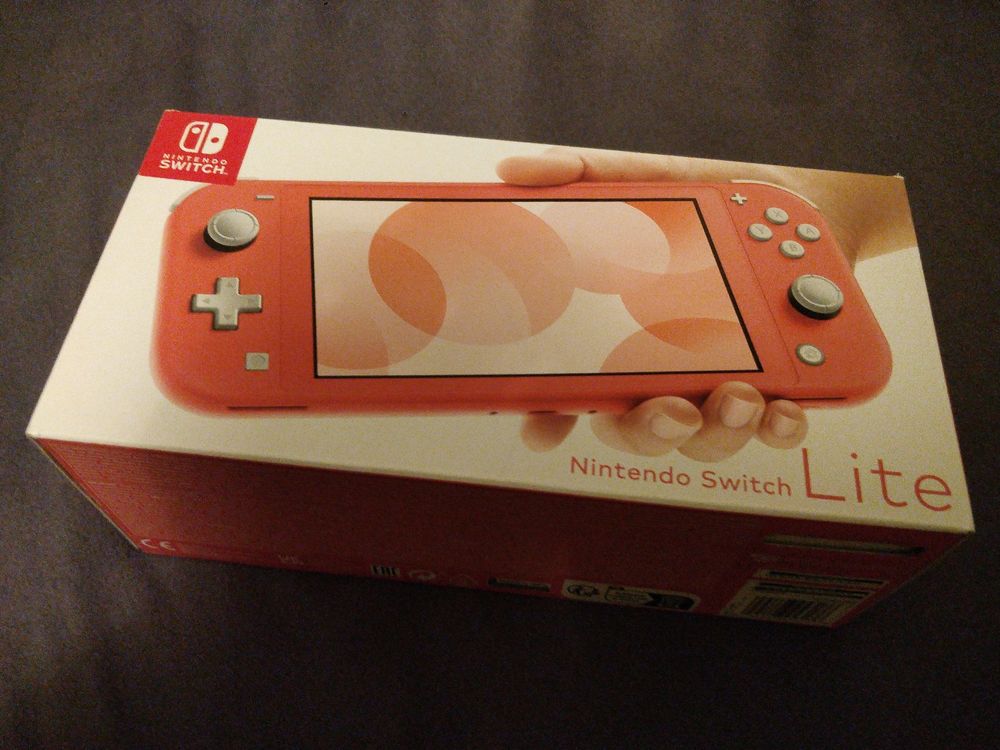 Nintendo Switch Lite - Coral (Neu und originalverpackt) in Wettingen ...