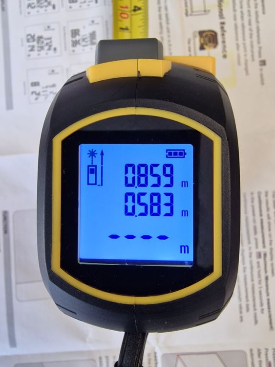 Rollmeter und Laser-Distanzmessgerät (Neu und originalverpackt) in ...