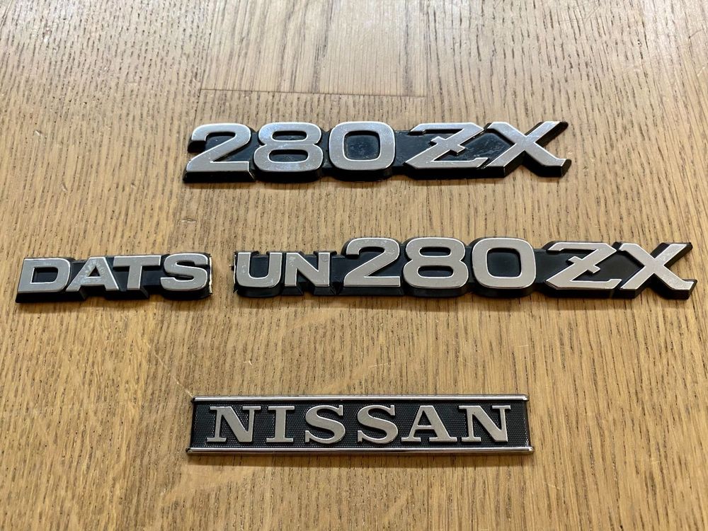 Datsun 280ZX Embleme und Nabenkappen (Gebraucht) in Zürich für CHF 42 ...