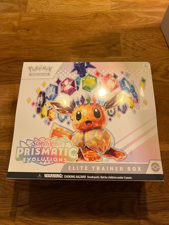 Pokémon Prismatic Evolutions Trainer Box (Neu und originalverpackt) in ...