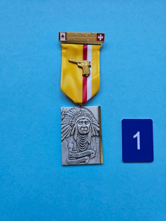 VANCOUVER SCHIESSEN KRANZABZEICHEN MEDAILLE MÜNZEN (Gebraucht) in Ermatingen für CHF 3.5 – mit ...