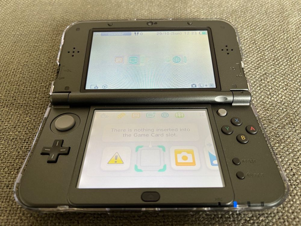 New Nintendo 3DS XL Metallic Black Top condition | Kaufen auf Ricardo