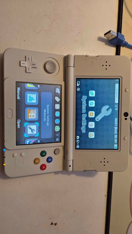 Nintendo New 3DS weiss + 2 Spiele (Gebraucht) in Rafz für CHF 120 – nur ...