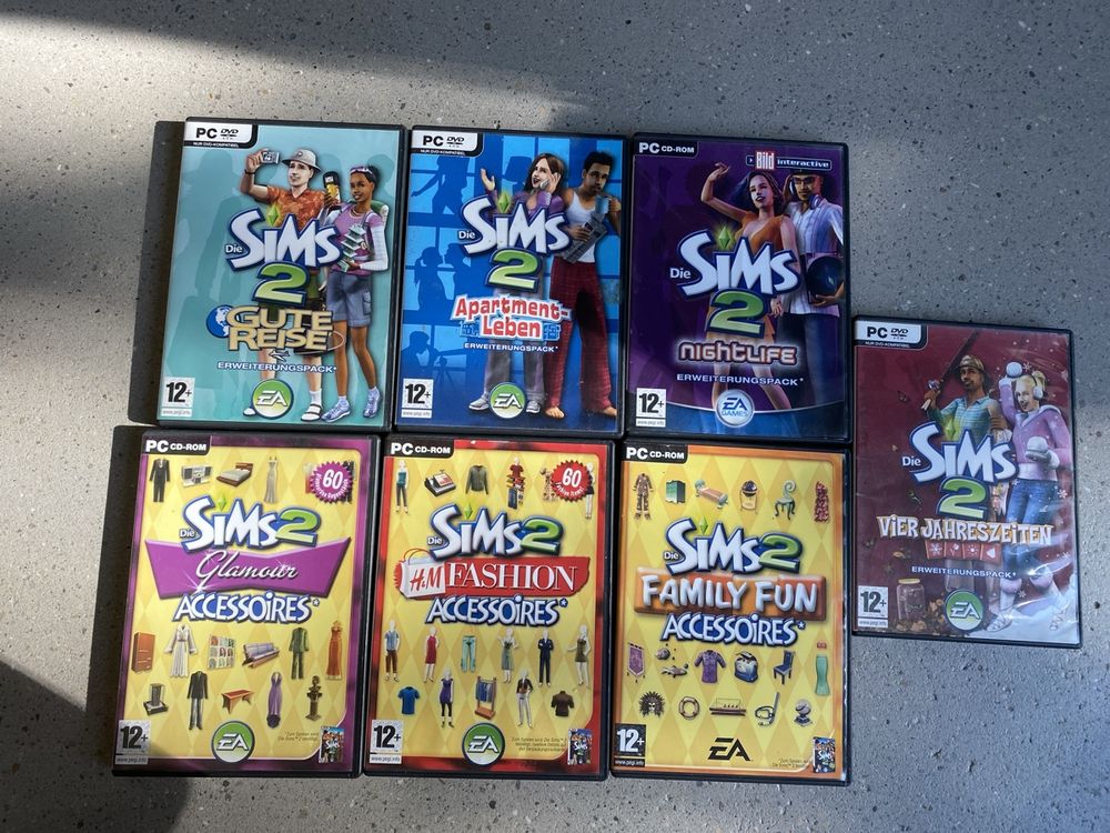 7 Erweiterungspacks für Sims 2 (Gebraucht) in Rüschlikon für CHF 5 ...