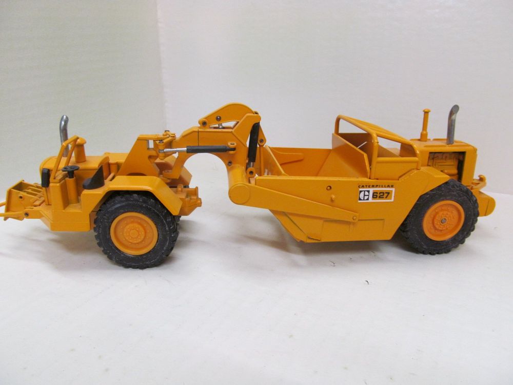 CATERPILLAR 627 1:50 MIT DOPPELMOTOR NZG | Kaufen auf Ricardo
