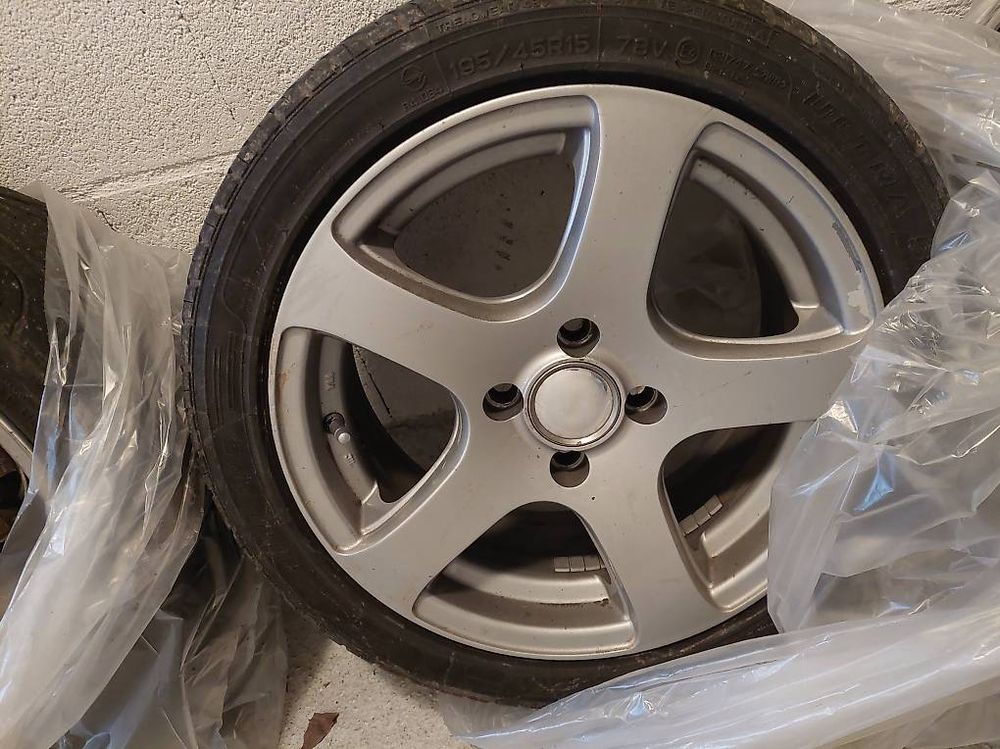 4 jantes alu avec pneus été 195/45/15 (Gebraucht) in Cernier für CHF ...