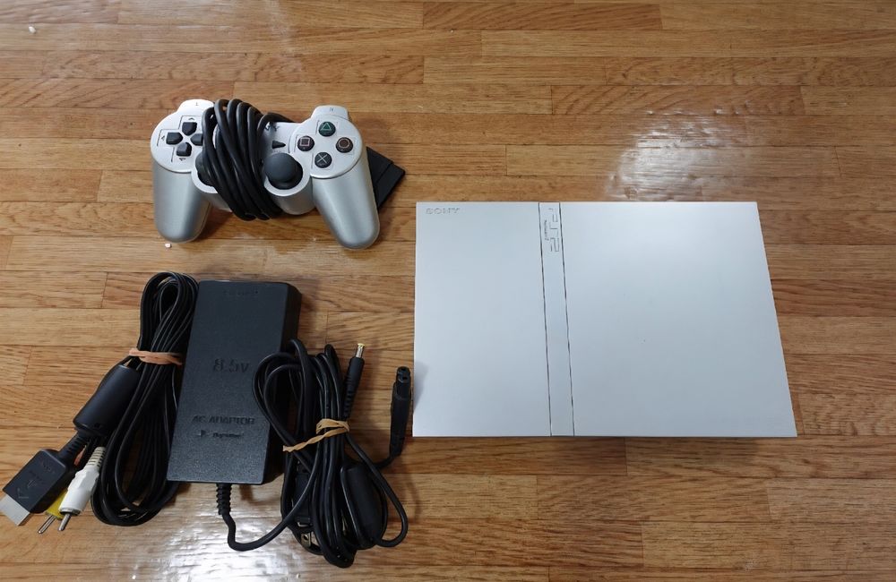 PlayStation 2 Slim Silver edition 👍 Memory Card 8MB (Gebraucht) in Allschwil für CHF 100 – mit ...